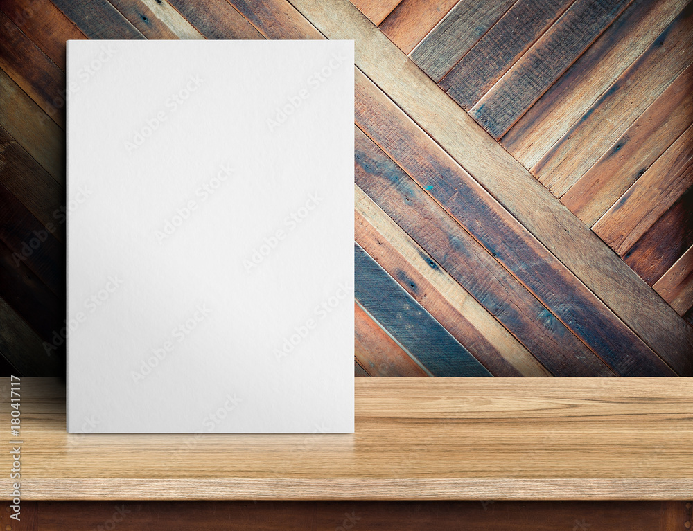 Blank White paper poster on wooden table at diagonal wood plank wall ...