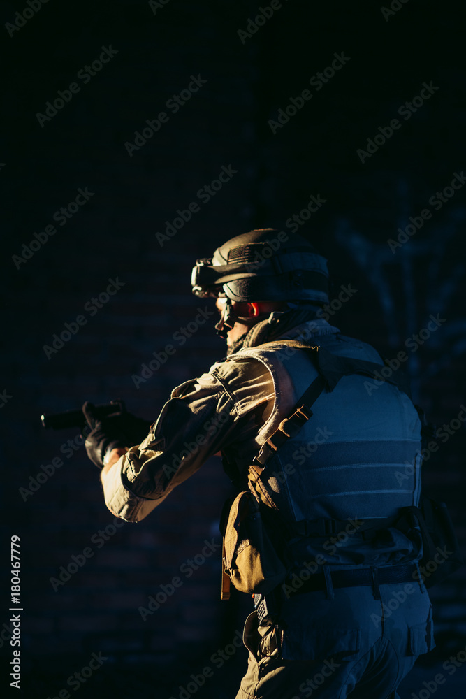 Army soldier in Protective Combat Uniform holding Special Operations ...