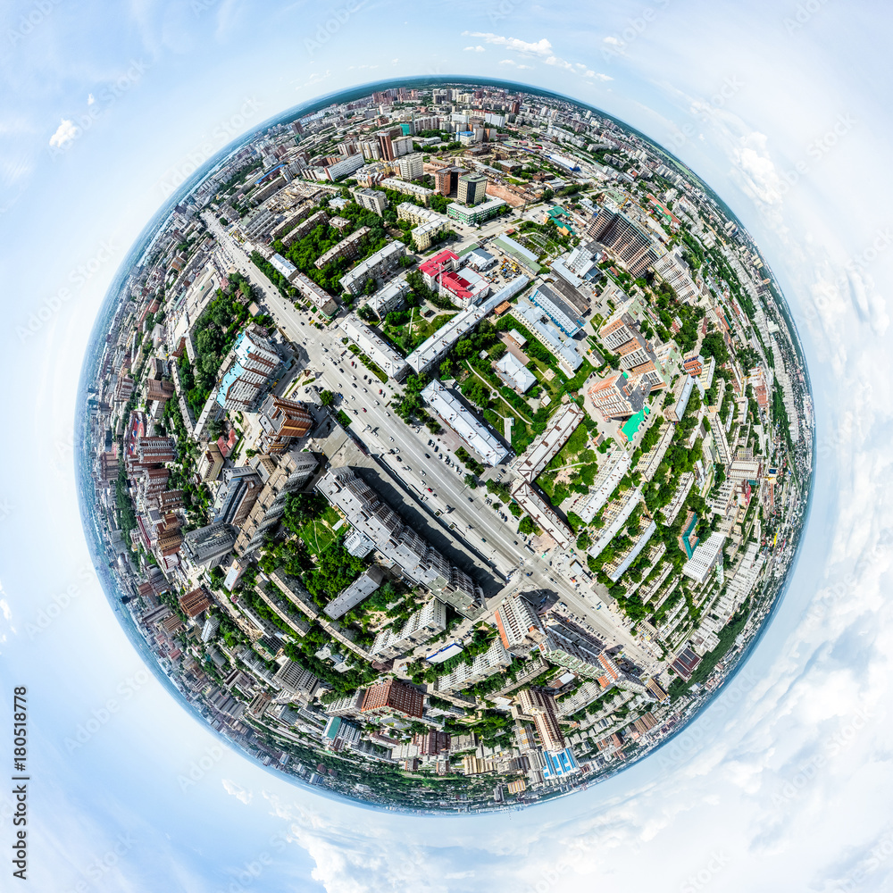 Aerial city view with crossroads and roads, houses, buildings, parks ...