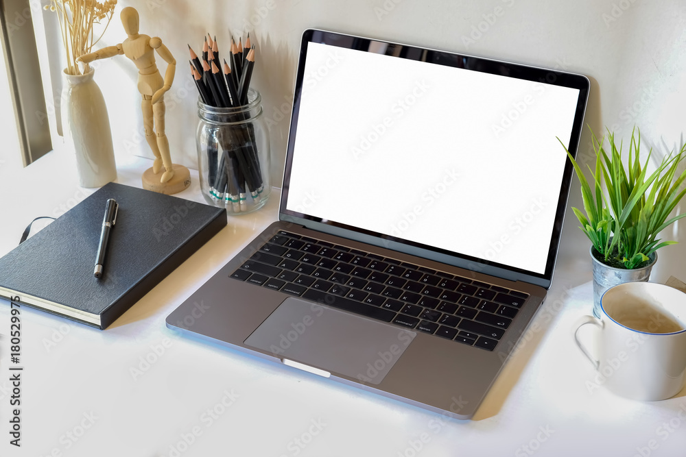 Mock up : Workspace white wood desk with blank screen labtop, book and ...