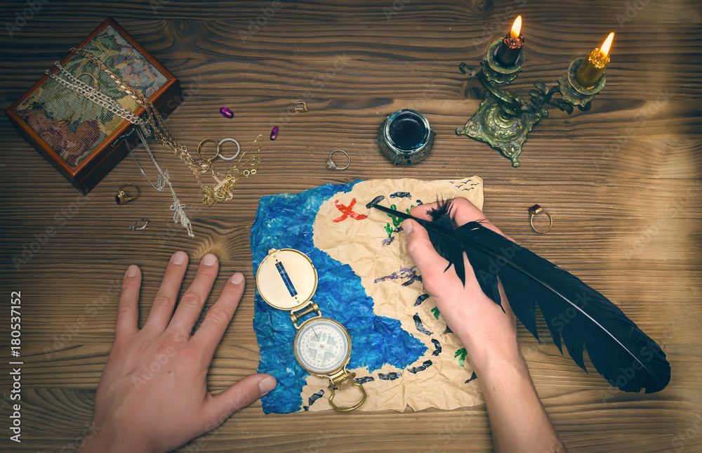 Treasure map on wooden table. Treasure hunt. Adventurer. The pirate ...