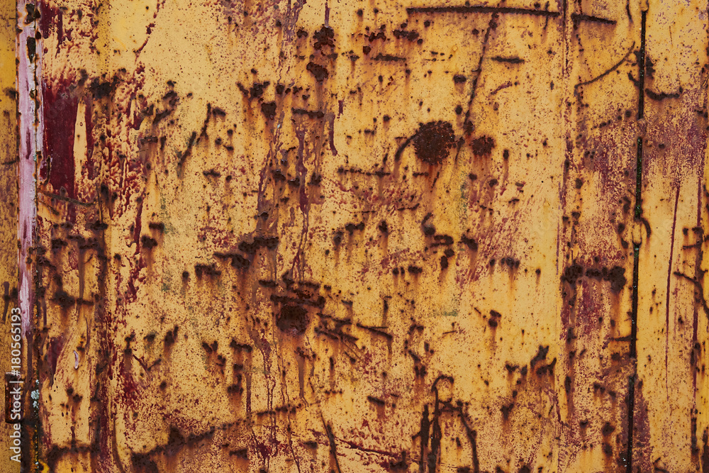 Rusty yellow painted metal wall. Rusty metal background with strips of ...