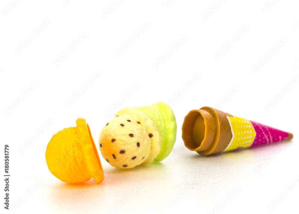 Children plastic toy, tower ice cream scoop drop to ground. white ...