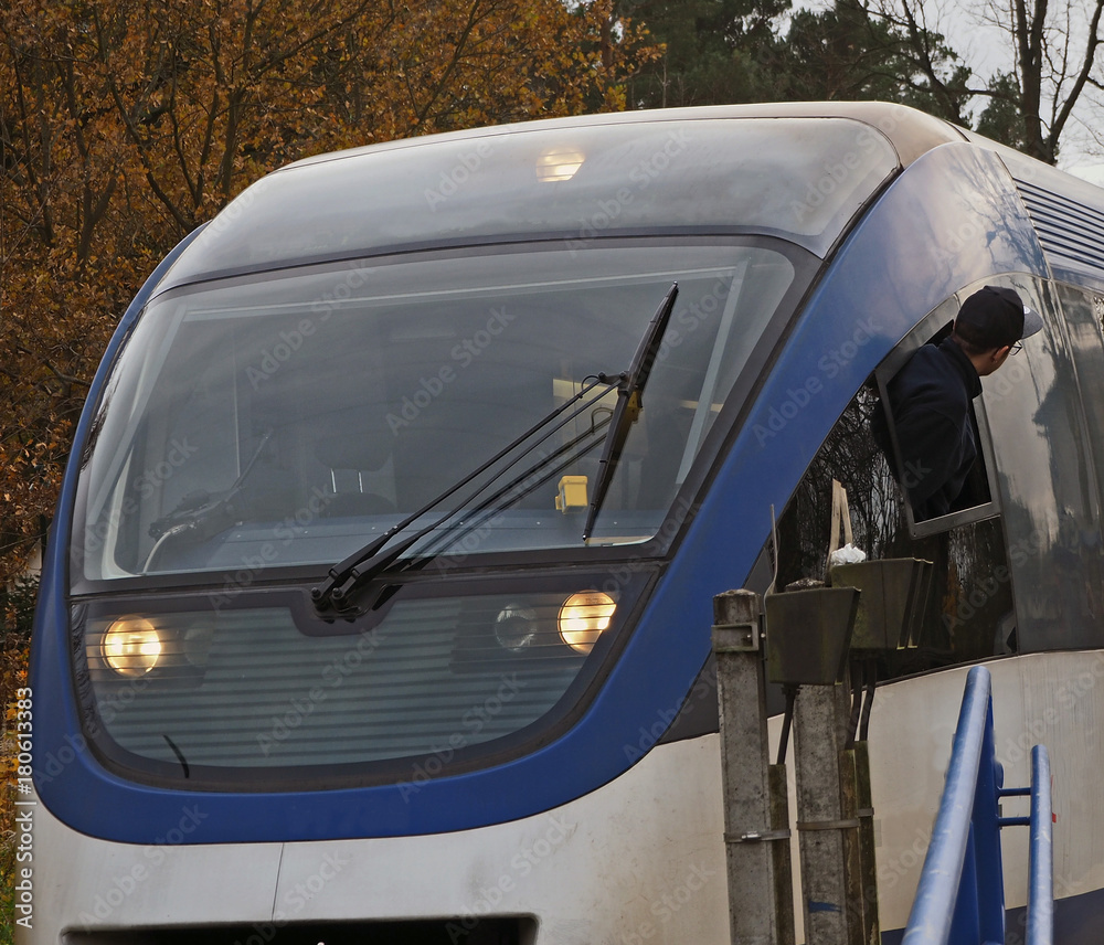Moderner Triebwagen mit Zugführer Stock Photo | Adobe Stock