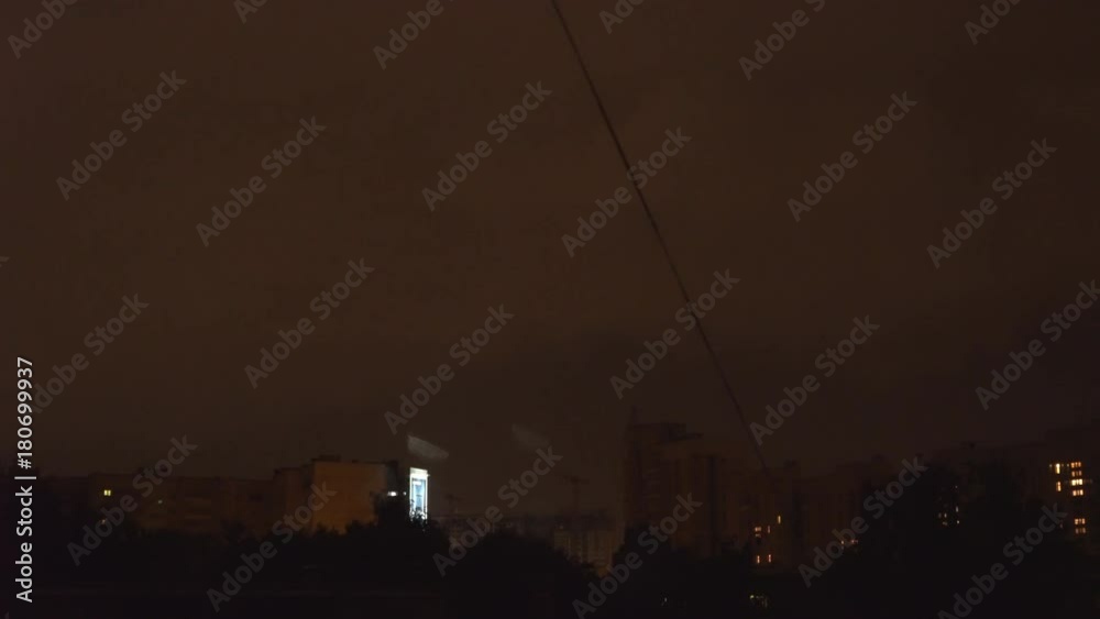 view from the window to the stormy sky. night outside, outside the ...