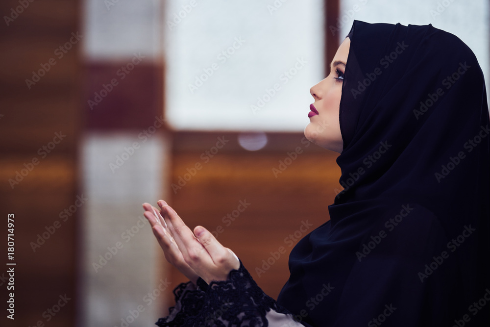 muslim woman praying in mosque Stock Photo | Adobe Stock
