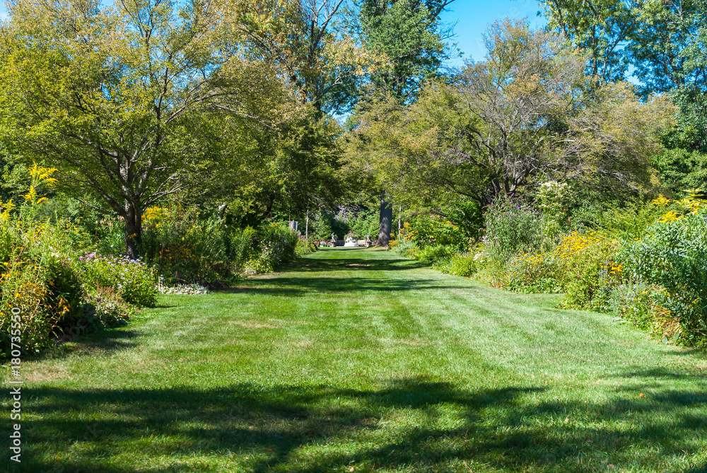 Garden path area. Open botanical garden path on grass. Grass and nature ...