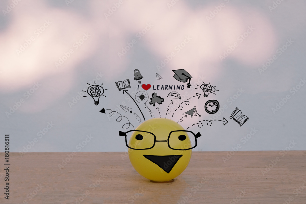 Happy smiley yellow ball wearing glasses with education and learning ...