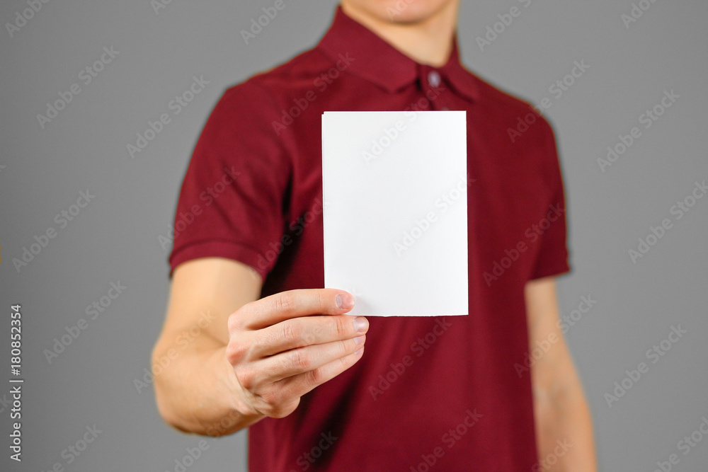 Man showing blank white flyer brochure booklet. Leaflet presentation ...