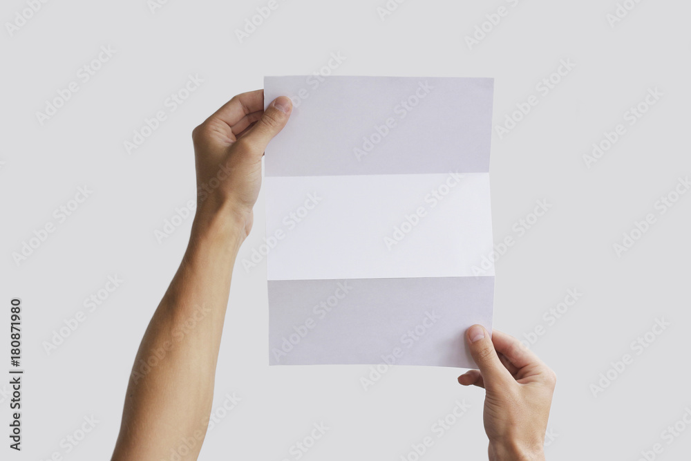 Hand holding blank brochure booklet in the hand. Leaflet presentation ...