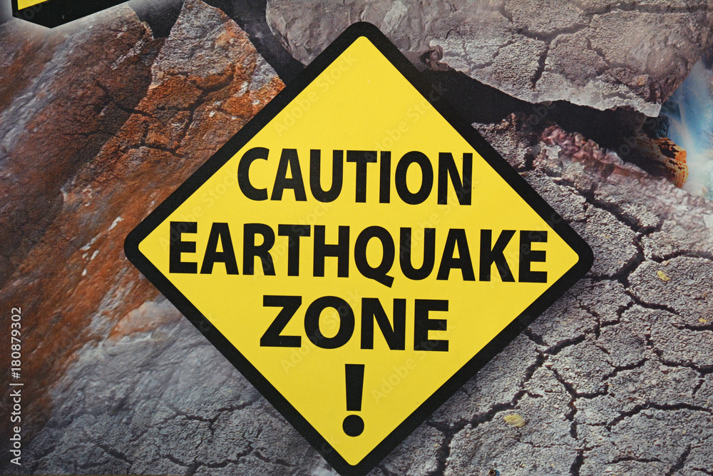 Sign - Caution Earthquake Zone! Stock Photo | Adobe Stock