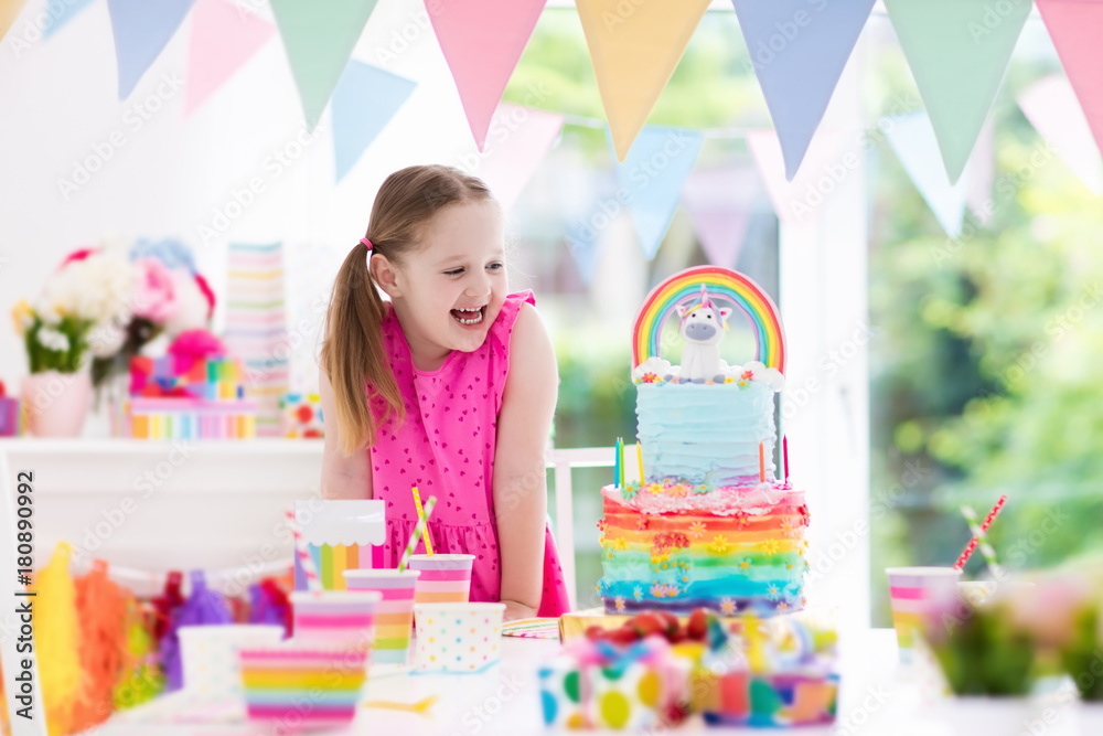 Kids birthday party. Little girl with cake. Stock Photo | Adobe Stock