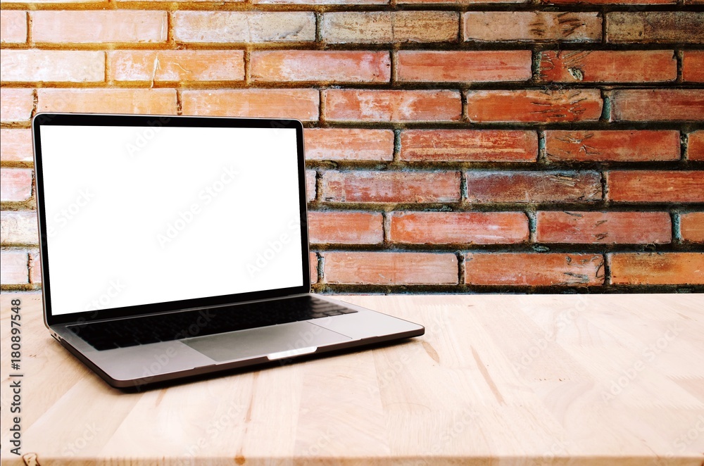 laptop notebook computer with white blank screen on desk with old ...