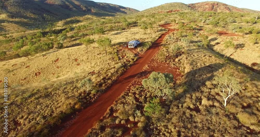 Aerial views of 4WD and large caravan free camping in the wilderness of ...
