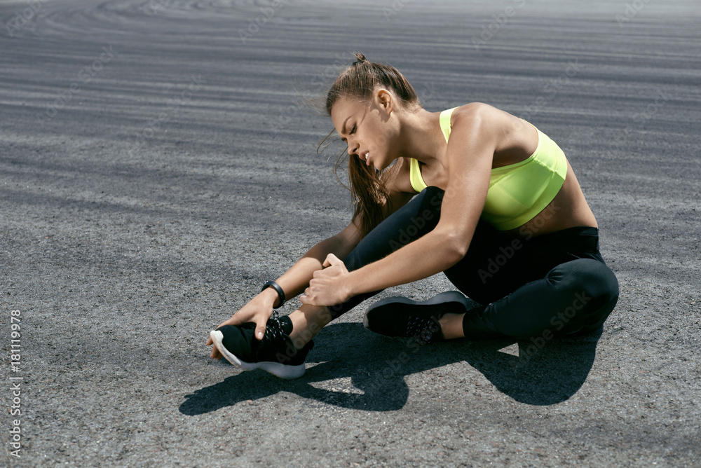 Leg Injury. Woman Suffering From Pain In Leg After Workout Stock Photo ...