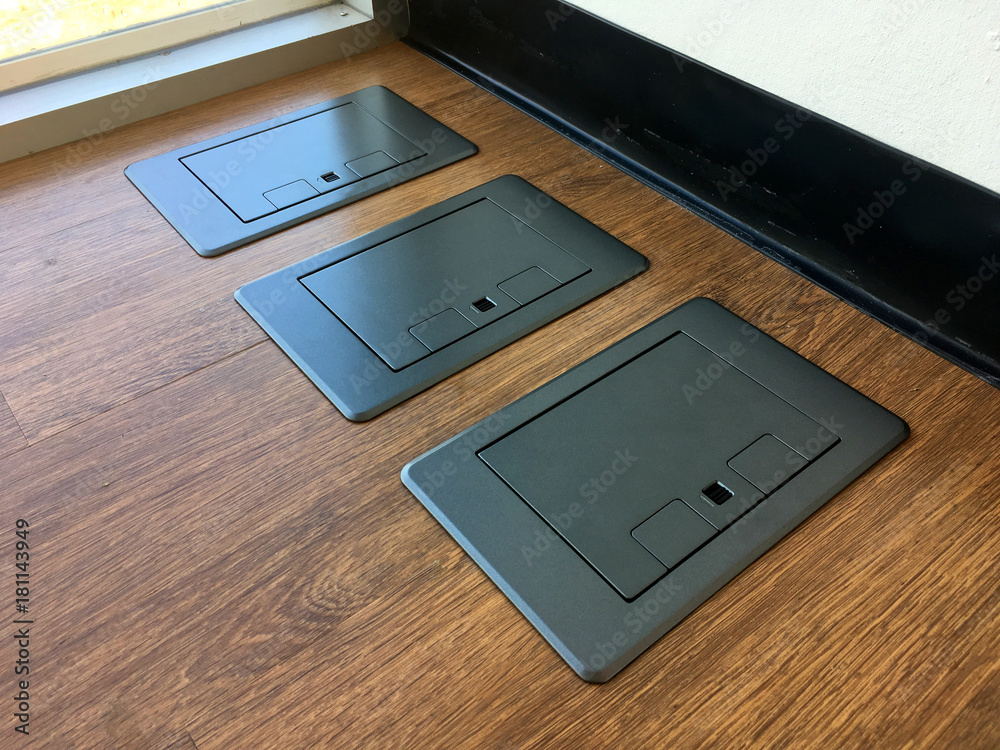 Floor plug,pop up plug in metal cover installed in wooden floor ...