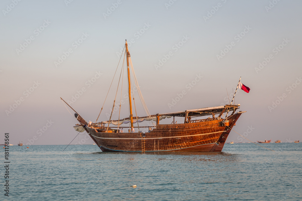 Traditional wooden boat dhow in Katara beach in Doha,Qatar Daylight ...