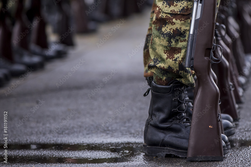 Soldiers stand in row. Gun in hand. Army, Military Boots lines of ...