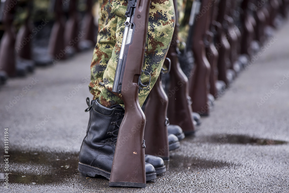 Soldiers stand in row. Gun in hand. Army, Military Boots lines of ...