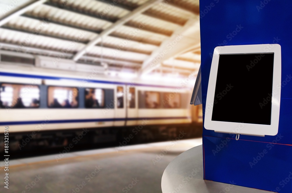 blank digital monitor or tablet on counter at subway train station ...