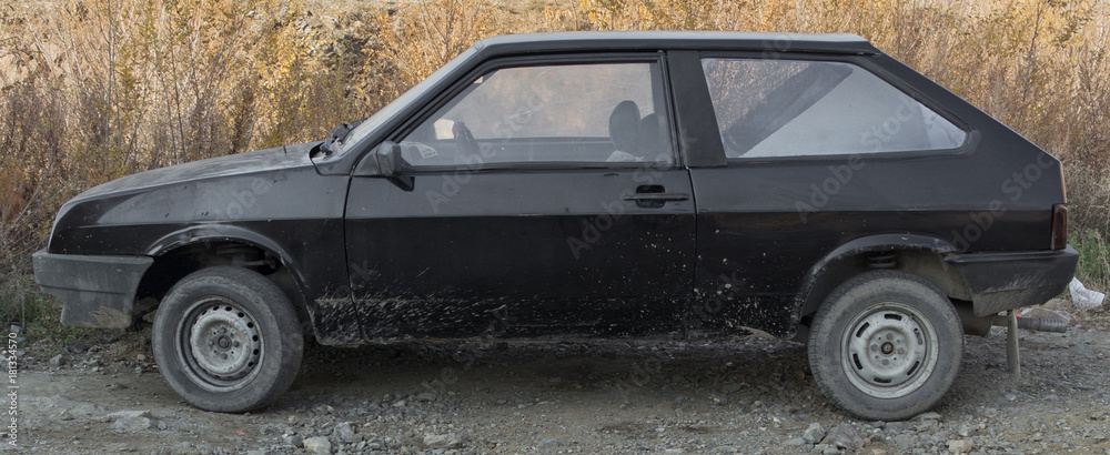 Old black car side view. Old hatchback. Retro car Stock Photo | Adobe Stock