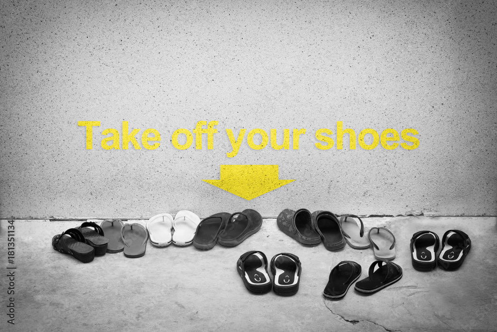 " take off your shoes " sign men's and women's shoes. Stock Photo ...
