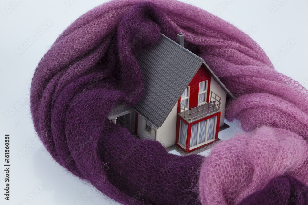 house with scarf. symbolfoto heat insulation Stock-Foto | Adobe Stock