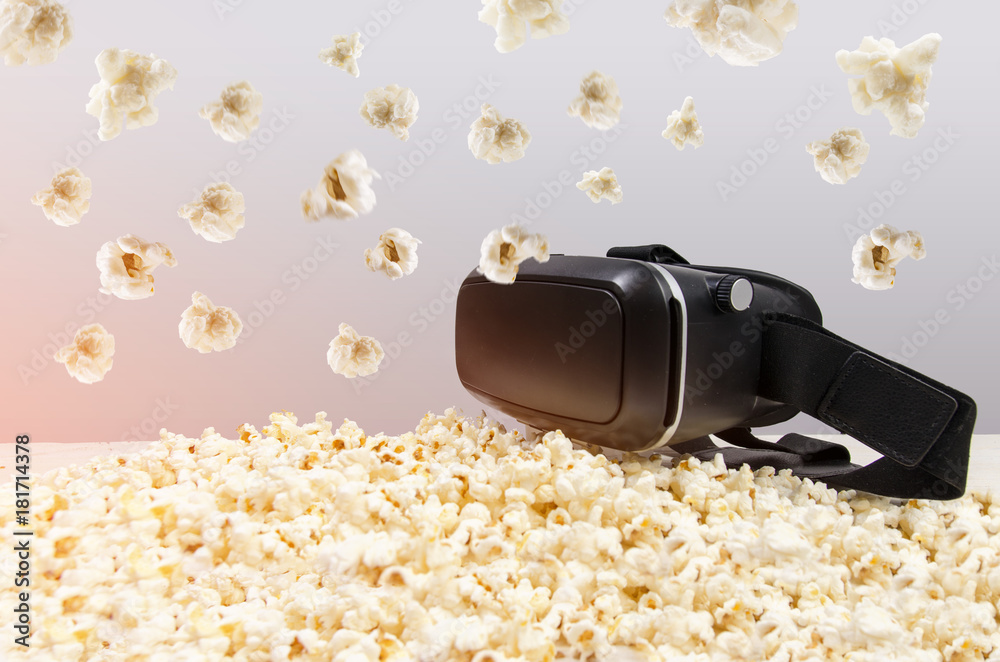 VR glasses on pile of pop corns representing VR movies, and VR ...