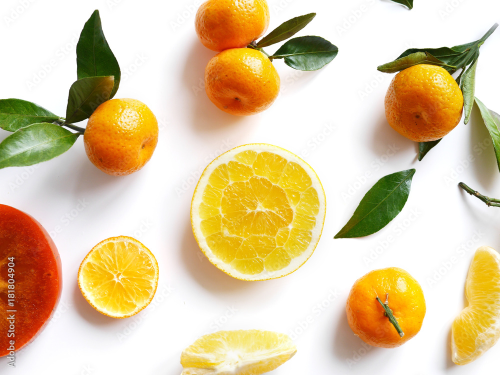 Creative flat layout of fruit, top view. Sliced orange, lemon ...