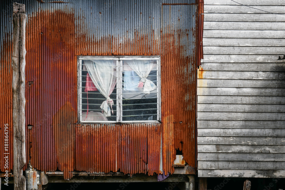 Rusty hovel in slum area in Thailand, house frontage with rusty ...