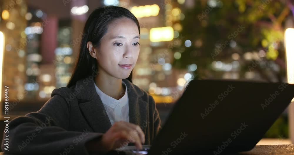 Asian businesswoman work on laptop computer at night Stock Video ...