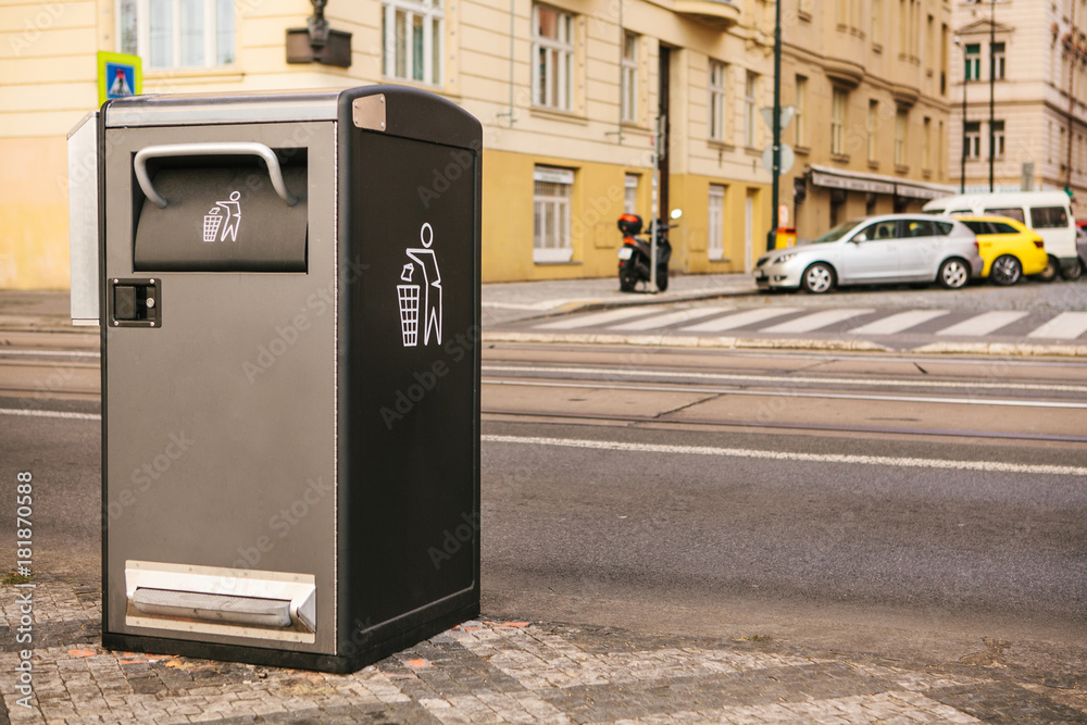 A modern smart trash can on the street in Prague in the Czech Republic ...