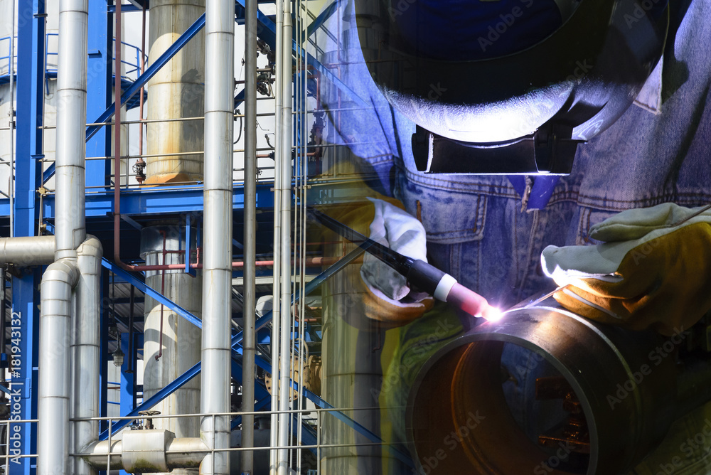 Abstract scene of welding operator and industrial pipeline. Stock Photo ...