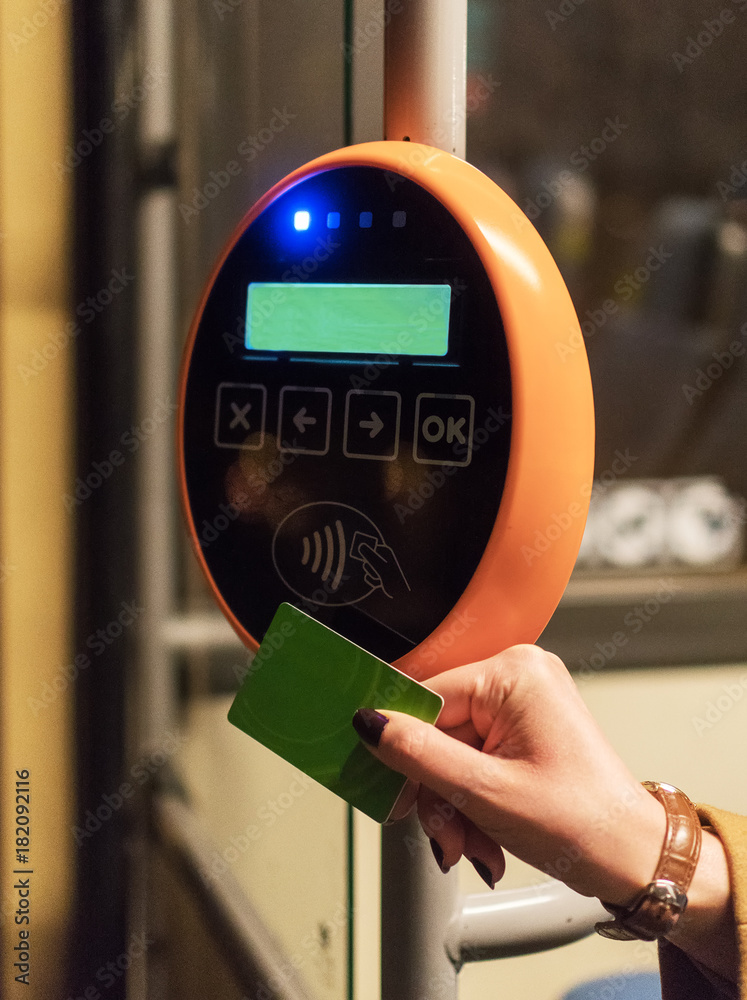 Ticket validation system on modern public transport. Stock Photo ...