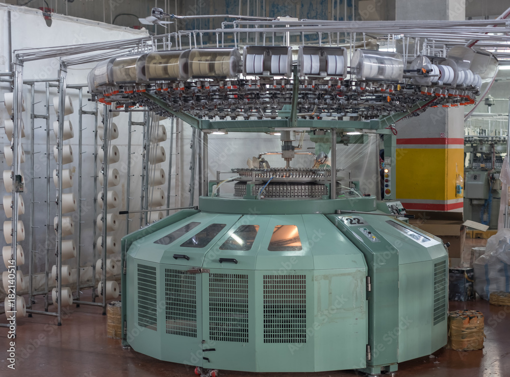 circular knitting machine Stock Photo | Adobe Stock