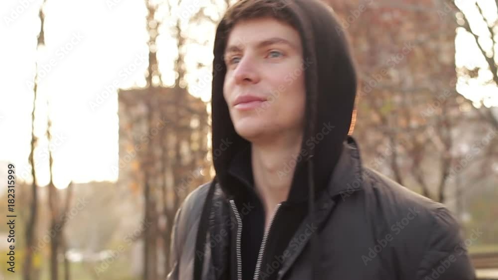 portrait of a handsome and slightly shy guy. Handsome smiling young man ...