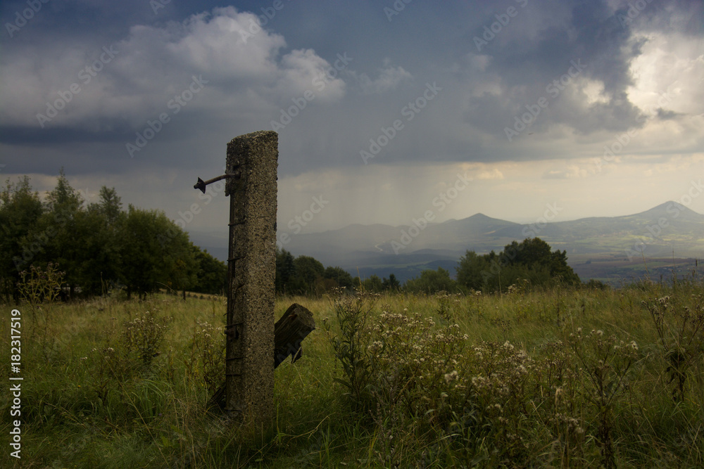 The great concrete pillar with steel bolt and nut and dramatic rainy ...