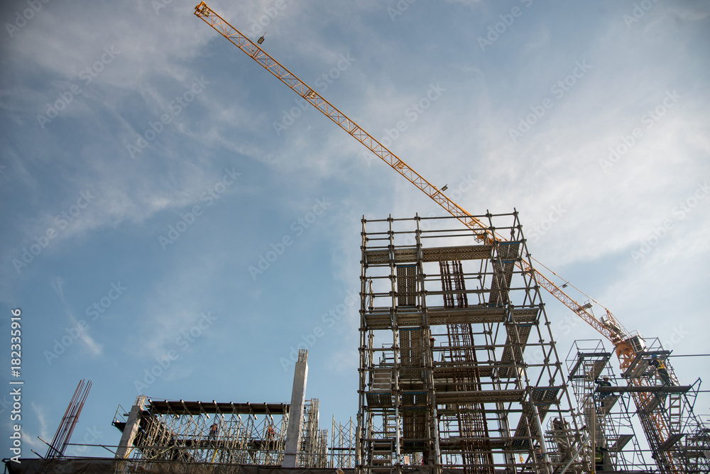 group of worker in safety uniform install reinforced steel column in ...