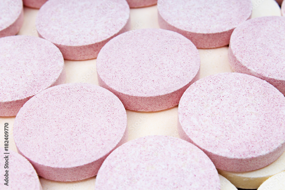 Stack of vitamin mineral supplement effervescent tablets pattern ...