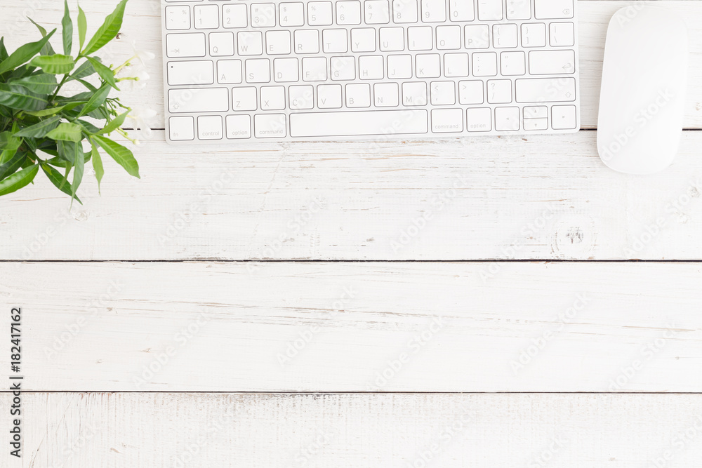 Flat lay photo of office desk with mouse and keyboard on white table ...