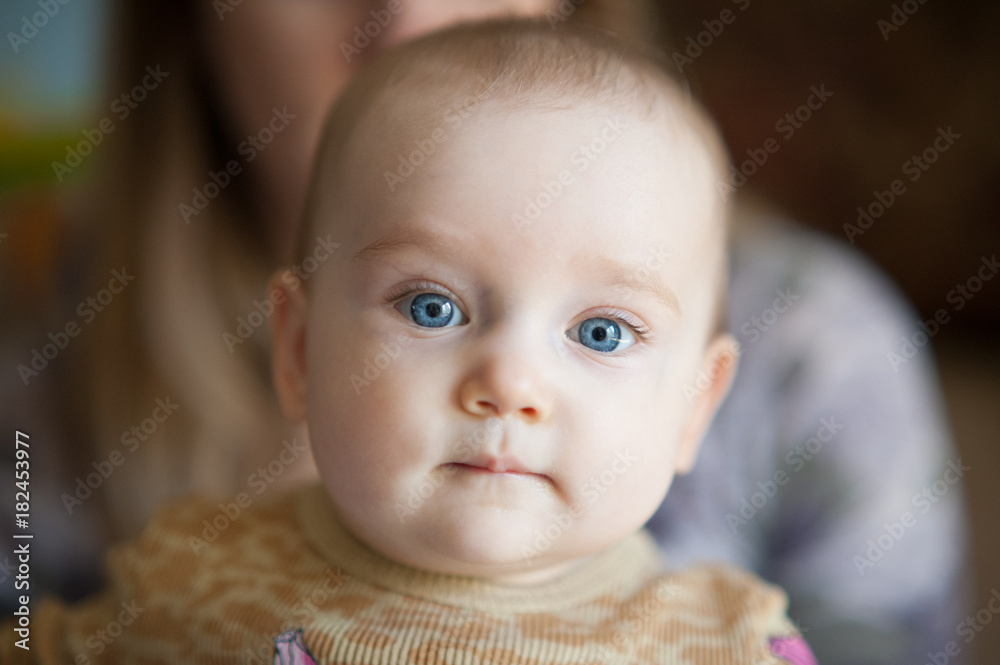 Baby Ellie with mom in background #30 Stock Photo | Adobe Stock