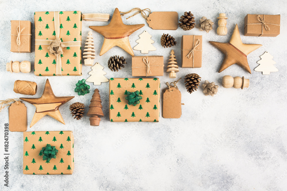 Christmas arrangement, brown present boxes with sparkling embossed fir ...