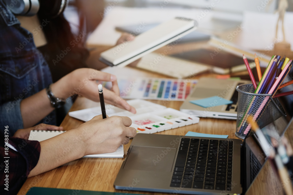 Teamwork,brainstorming concept. Creative designer at the workshop ...