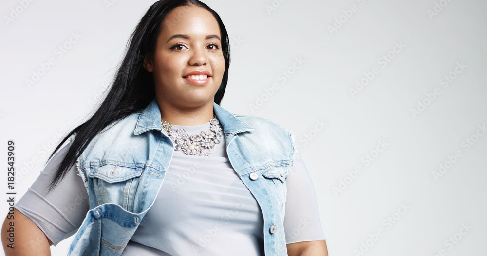 Plus size model in studio shoot happy smiling Stock Photo | Adobe Stock