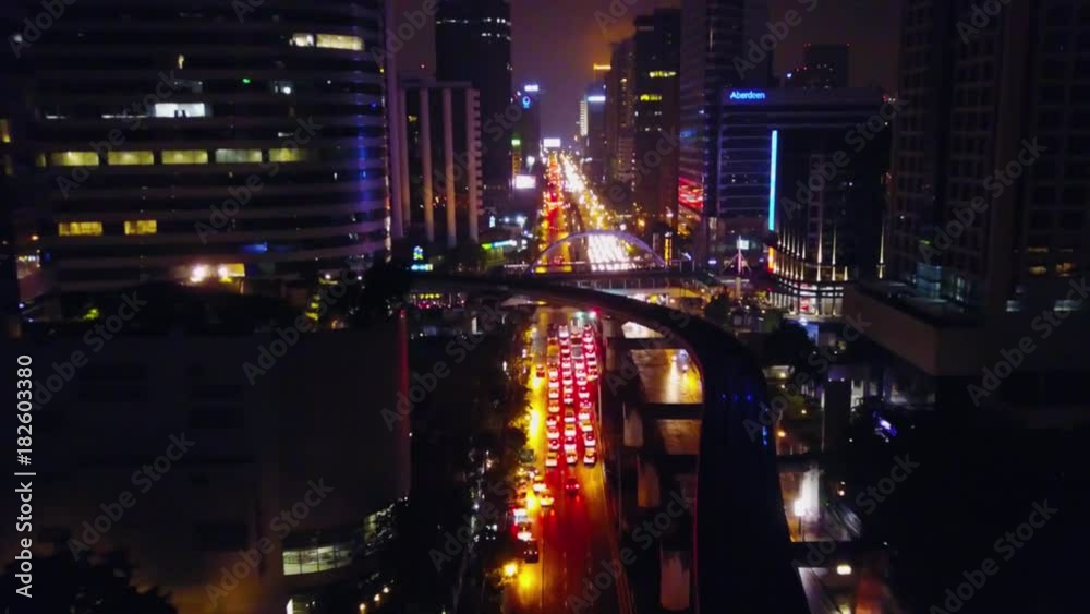 A massive highway intersection from above at night in Shinjuku, Tokyo ...