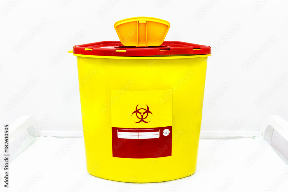 Yellow biohazard medical contaminated sharps clinical waste container ...