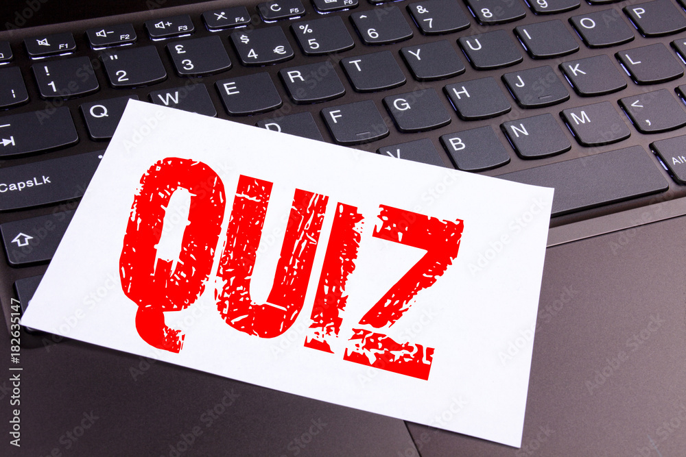 Writing Quiz text made in the office close-up on laptop computer ...