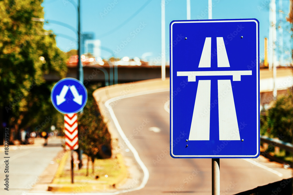 Blue sign of entrance to a freeway with empty ramp Stock Photo | Adobe ...