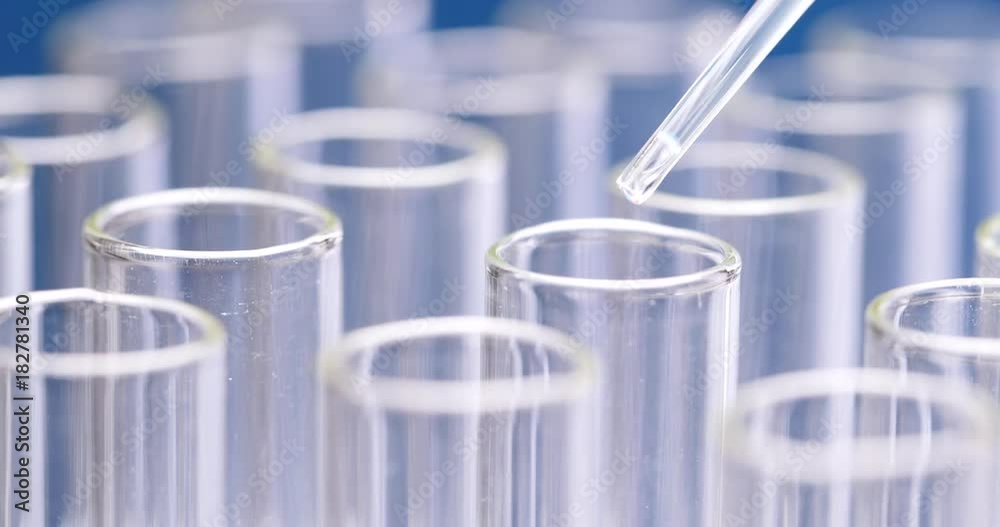 Experiment with test tube in laboratory Stock Video | Adobe Stock