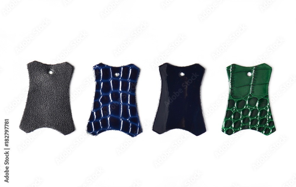 Samplers of different types of leather products isolated on white ...